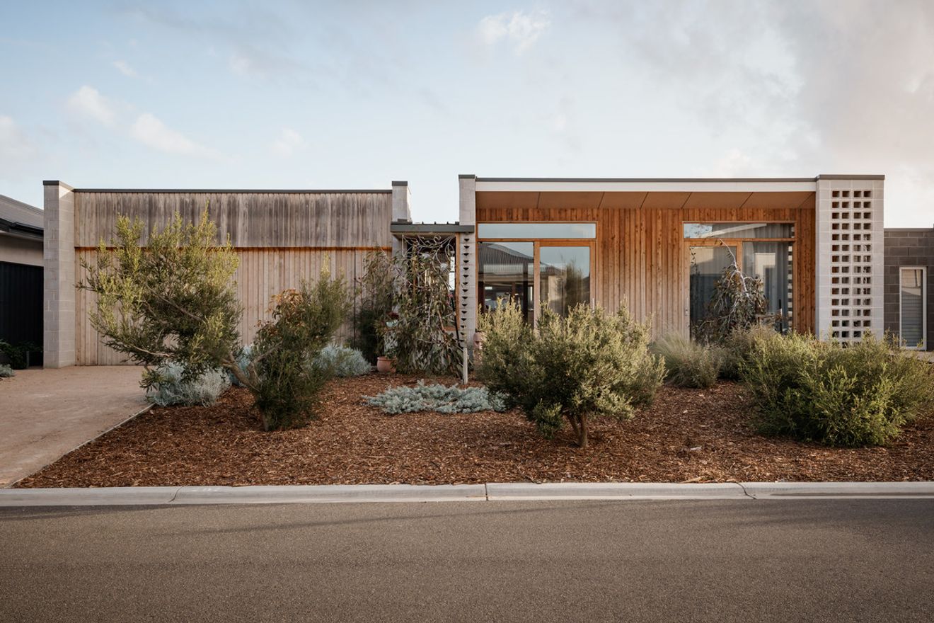 Courtyard design creates a sunny, yet protected, coastal home