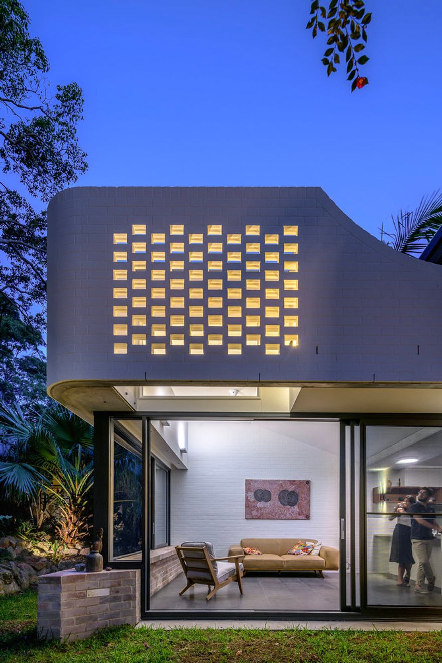 A Lounge Pavilion Set in a Sunken Garden Feels Both Indoors and Out