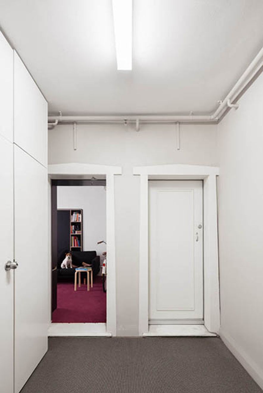 There's a Bedroom Tucked Behind that Sliding Wall!