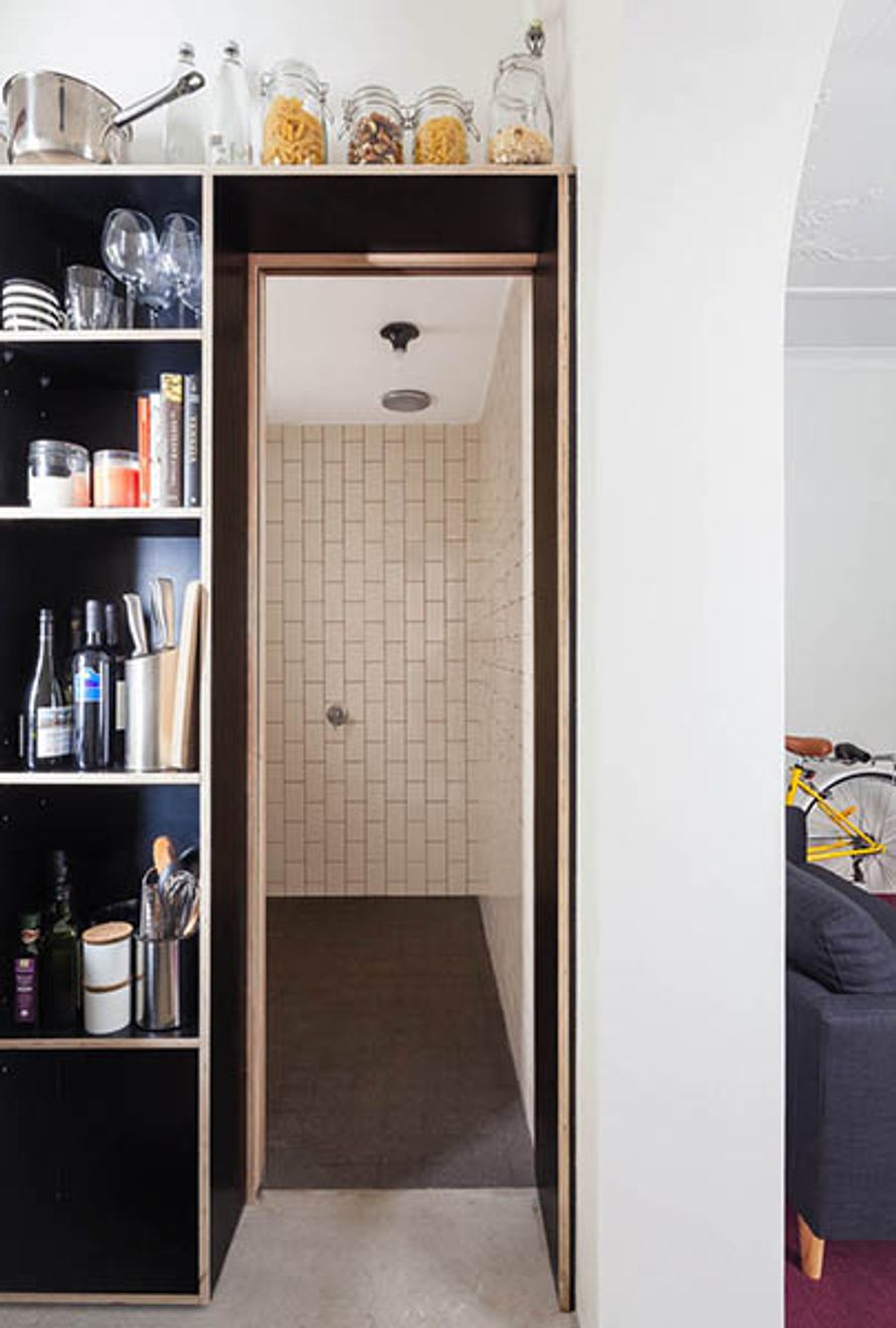 There's a Bedroom Tucked Behind that Sliding Wall!