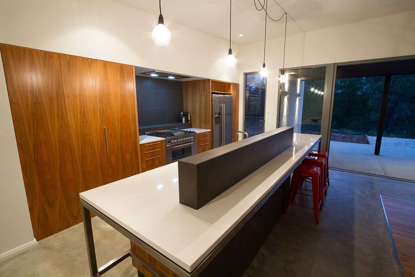 Wall and Wall House Uses Rammed Limestone for Style and Substance