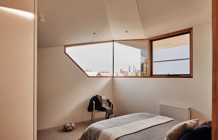 An intricate roofline, folded like origami, grabs light and views