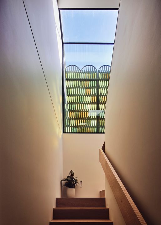 An intricate roofline, folded like origami, grabs light and views