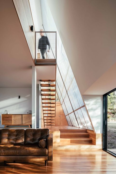 New Spaces Draped Around an Original Cedar-lined Shack Like a Tent