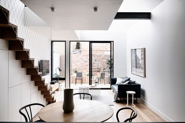 A Double Height Space Brings Light Into This Previously Dark Cottage