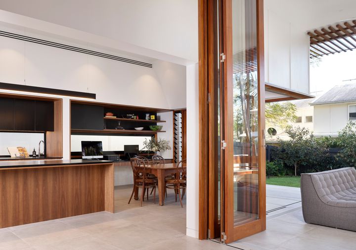 This modern Queenslander has a surprise behind its unassuming facade