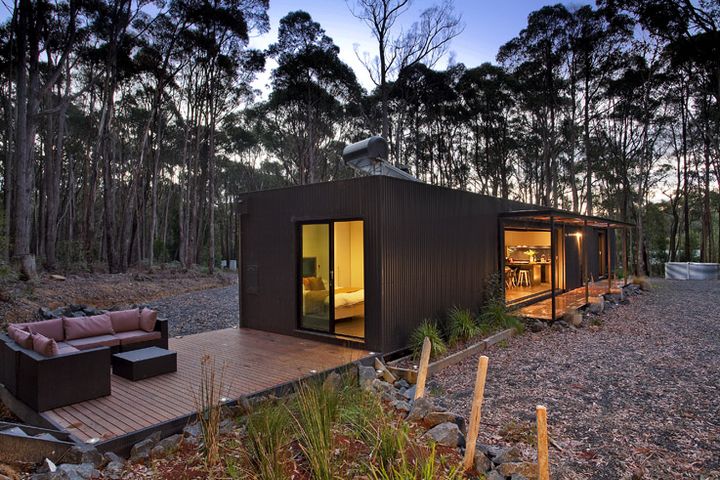 A Perfectly Proportioned Prefab Cabin Secluded in a Forest Clearing
