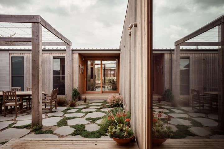 Courtyard design creates a sunny, yet protected, coastal home