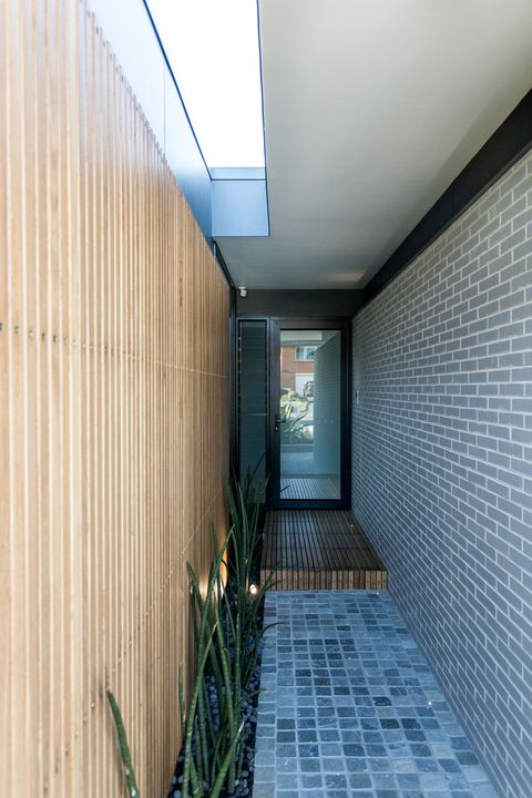 1970s-era Red Brick Home Completely Transformed by Modern Renovation