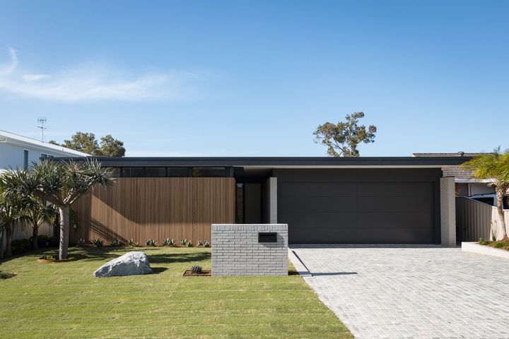 1970s-era Red Brick Home Completely Transformed by Modern Renovation