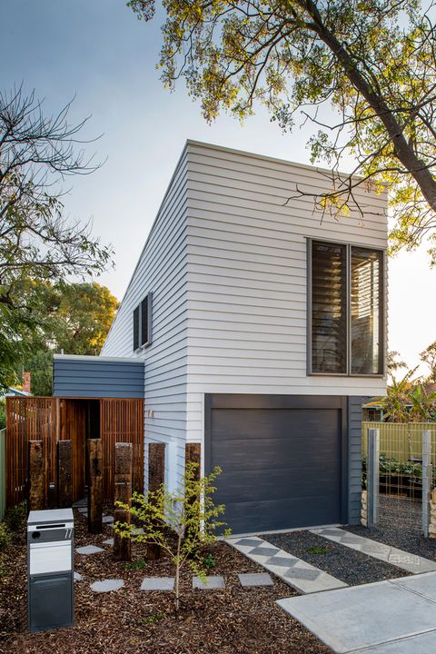 A Compact Home Makes the Most of Light and Space on a Tight Block