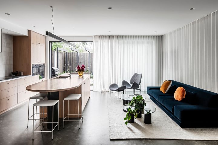 These down-sizers wanted a modern home in a walkable neighbourhood...