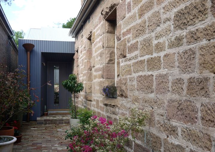 Historic Sandstone Cottage Shows Off Refined Contemporary Addition