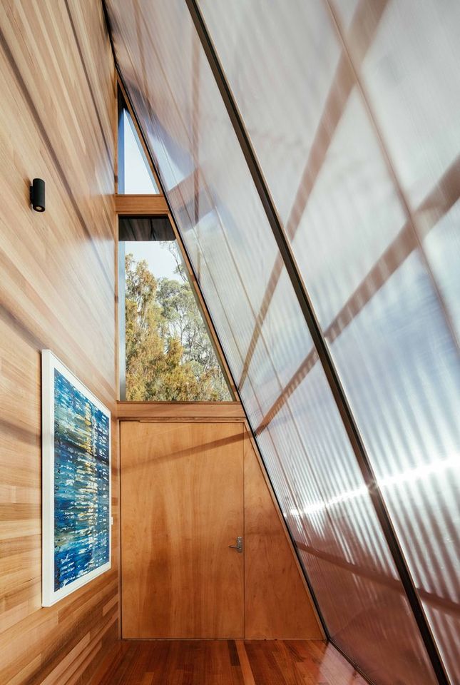 New Spaces Draped Around an Original Cedar-lined Shack Like a Tent