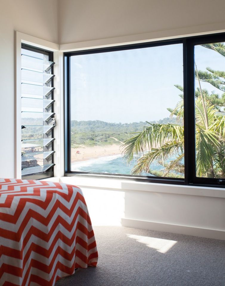 This Green Roofed Beach House Arrived on the Back of a Truck