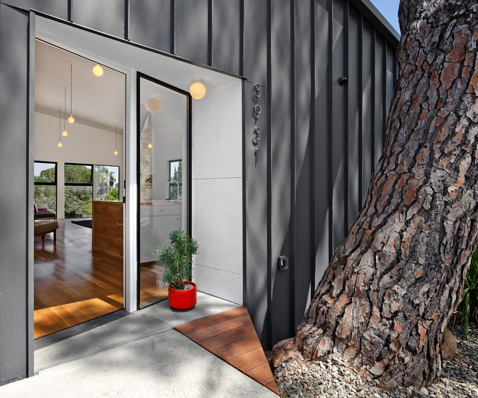 A Single-Space Living Area Helps this Compact Home to Feel Spacious