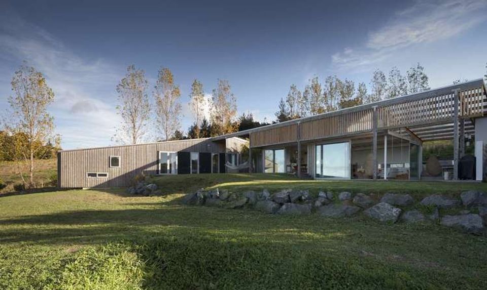 Batten and Board Beach Home is Designed Like an 'Elegant Shed'