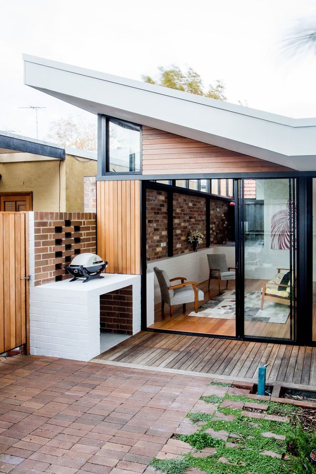Reclaimed Bricks Provide Warmth and Solidity to Otherwise Light Home