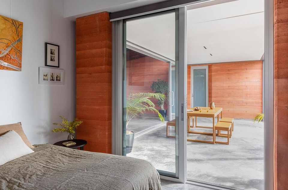 Rammed Earth Walls and Passive Design Makes Every Season a Breeze