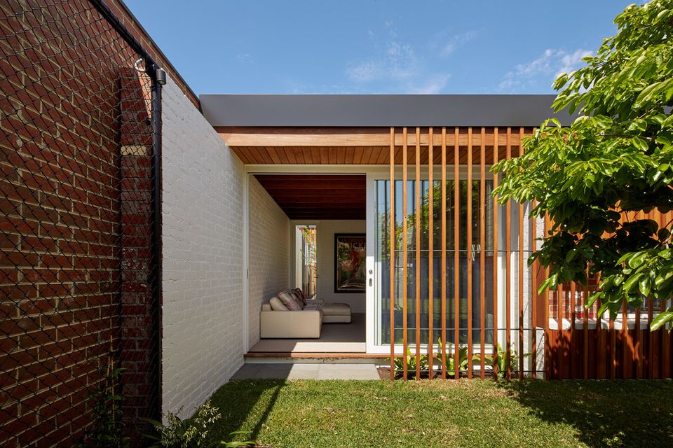 Rich Materials and Light-Filled Courtyards Connect Old to New