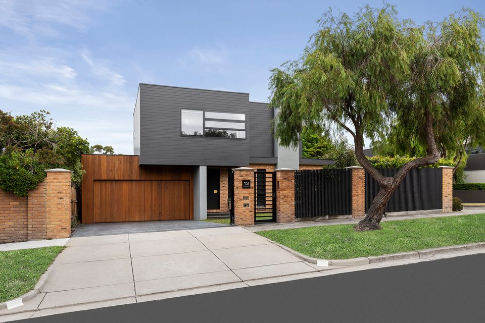 Architect Transforms a '90s Apricot Brick House Into a Modern Home
