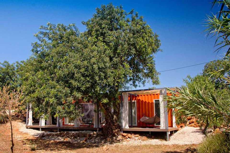 Rusty Shipping Container Transformed into a Glamorous Guest House