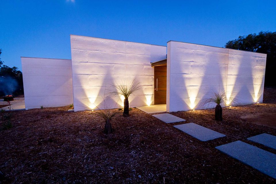 Wall and Wall House Uses Rammed Limestone for Style and Substance